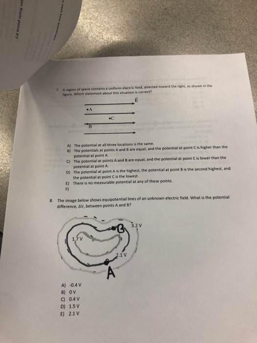 Solved 7 A Region Of Space Contains A Uniform Electric F