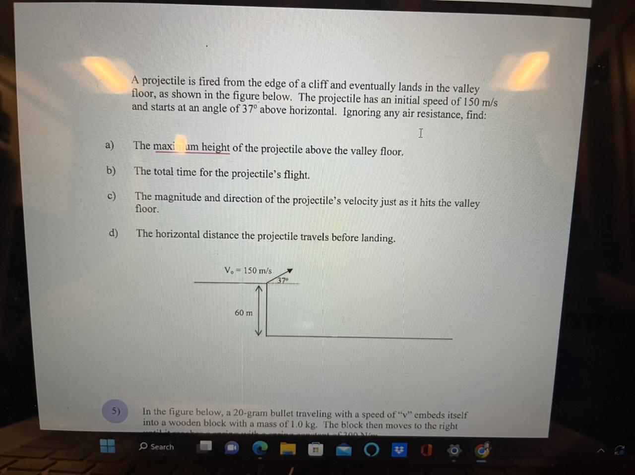 Solved A projectile is fired from the edge of a cliff and | Chegg.com