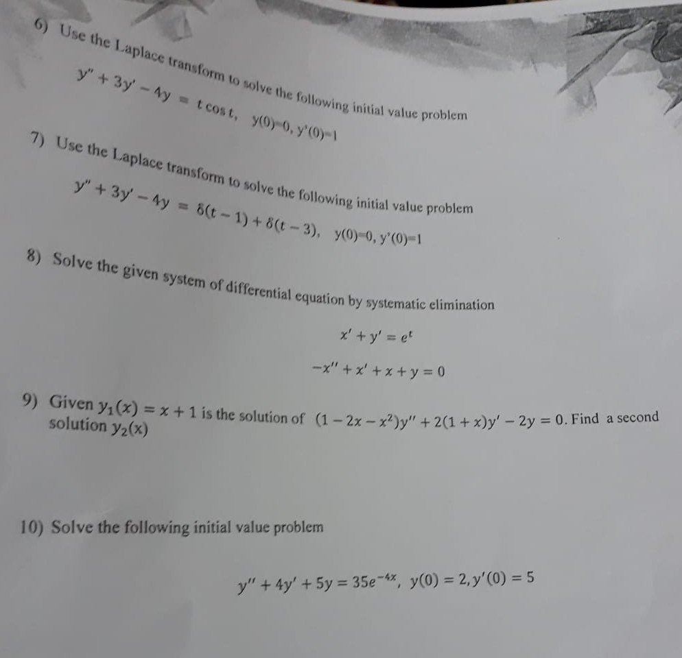 use the laplace transform to solve the given system of differential equations