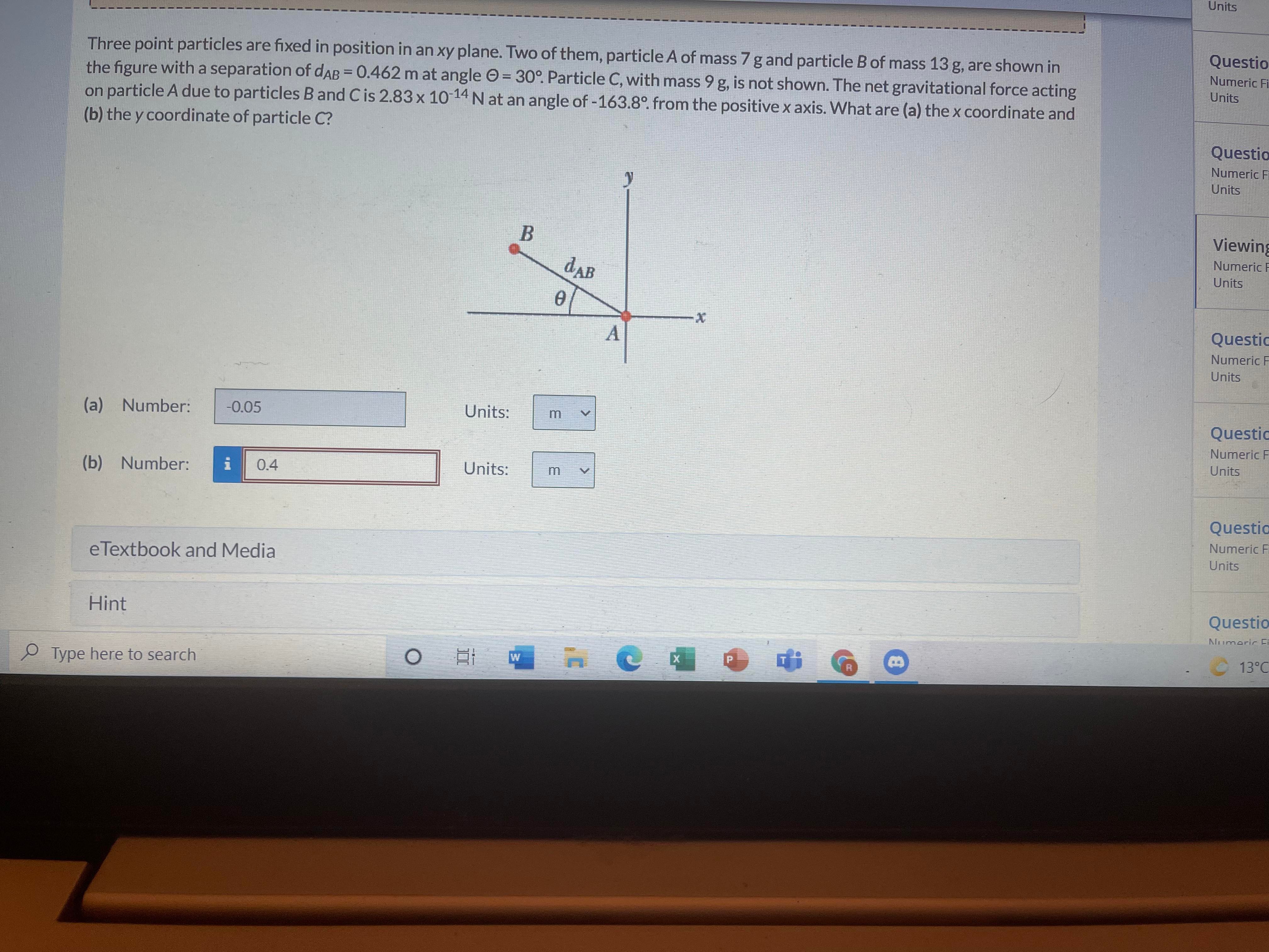 Solved Units = Three point particles are fixed in position | Chegg.com