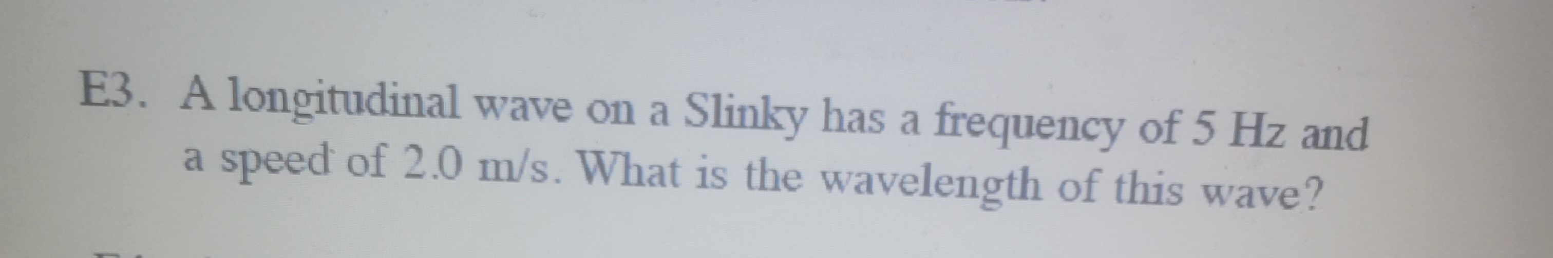 Solved E3. ﻿A longitudinal wave on a Slinky has a frequency | Chegg.com