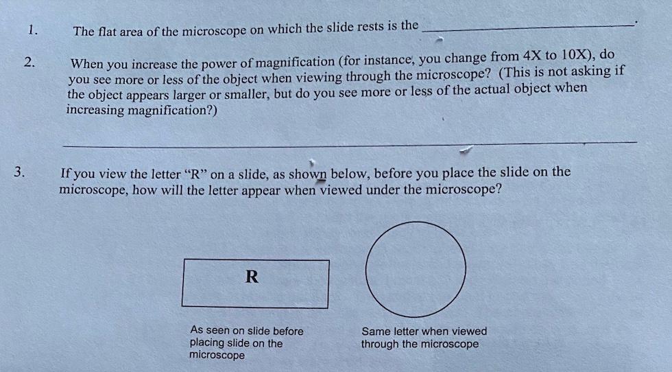 Solved 1. The flat area of the microscope on which the slide | Chegg.com