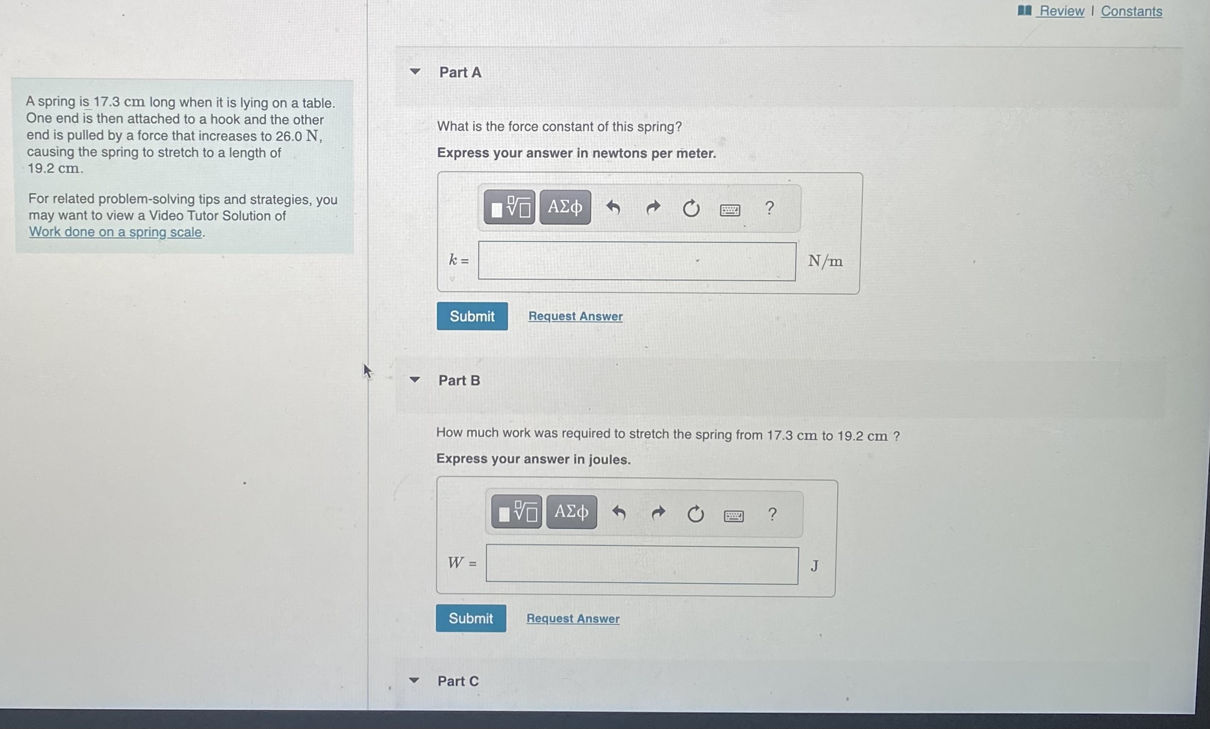 Solved A spring is 17.3 cm long when it is lying on a table. | Chegg.com