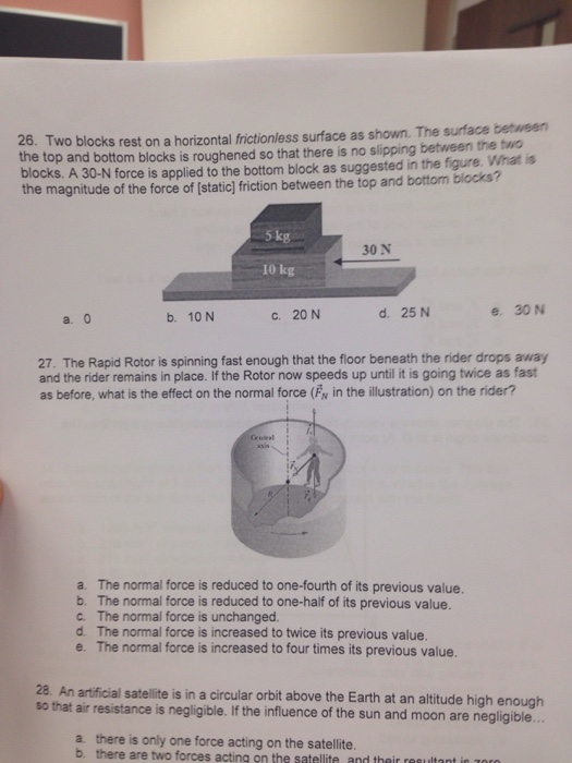 Solved Two blocks rest on a horizontal frictionless surface | Chegg.com