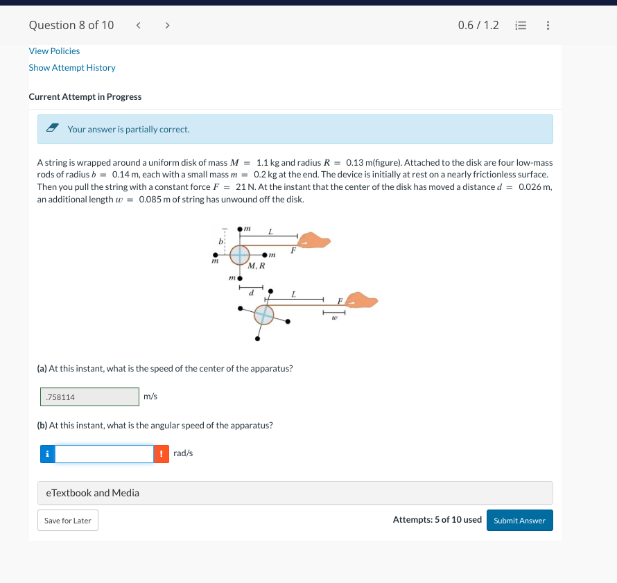 A string is wrapped around a uniform disk of mass M = | Chegg.com