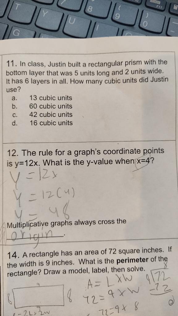 Solved 11. In class, Justin built a rectangular prism with | Chegg.com