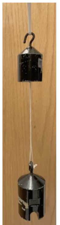 Solved Two masses are hanging from two strings as shown in | Chegg.com