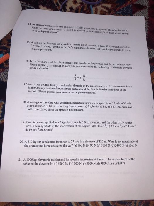 Solved 14. An internal explosion breaks an object, initially | Chegg.com