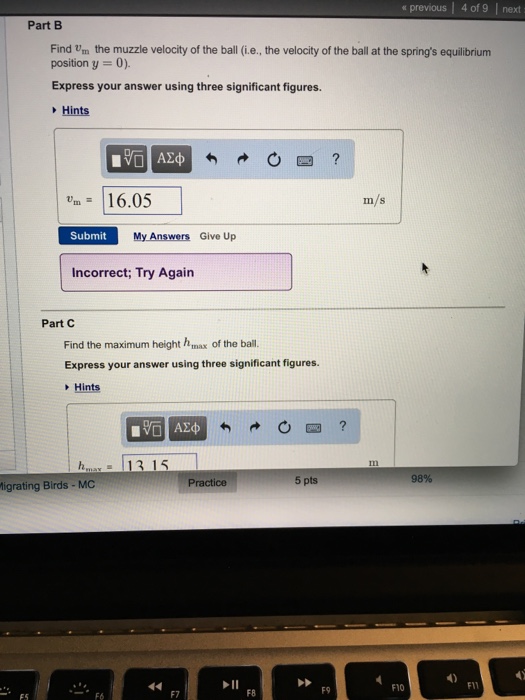 Solved as A spring-loaded toy gun is used to shoot a ball of | Chegg.com