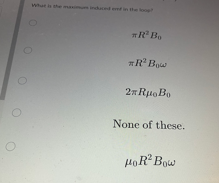 Solved A circular loop of wire (radius R ) lies flat on a | Chegg.com