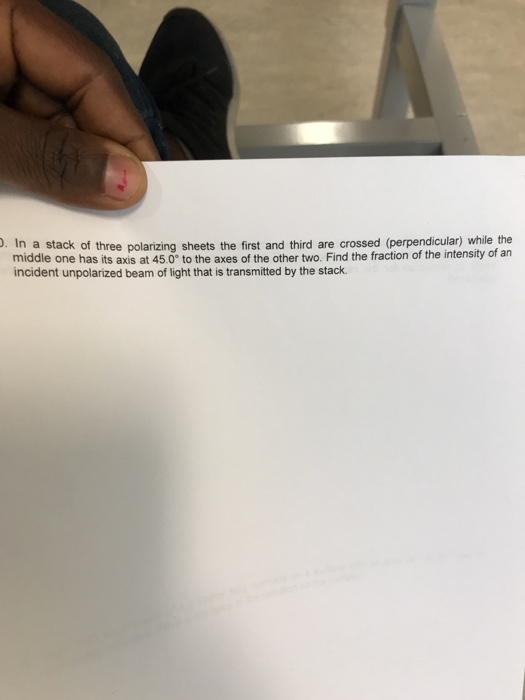 Solved . In a stack of three polarizing sheets the first and | Chegg.com