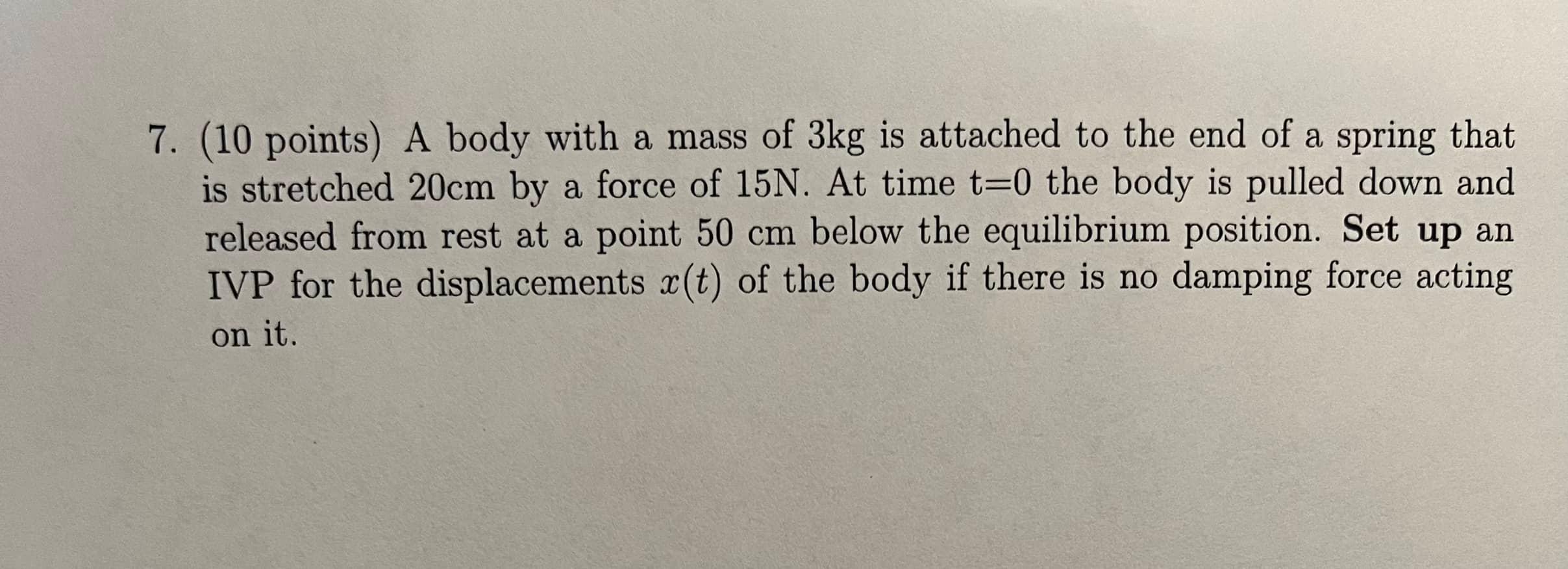 Solved 7. (10 points) A body with a mass of 3 kg is attached | Chegg.com
