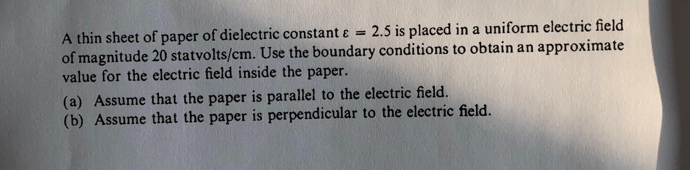 Solved A thin sheet of paper of dielectric constant ε=2.5 is | Chegg.com