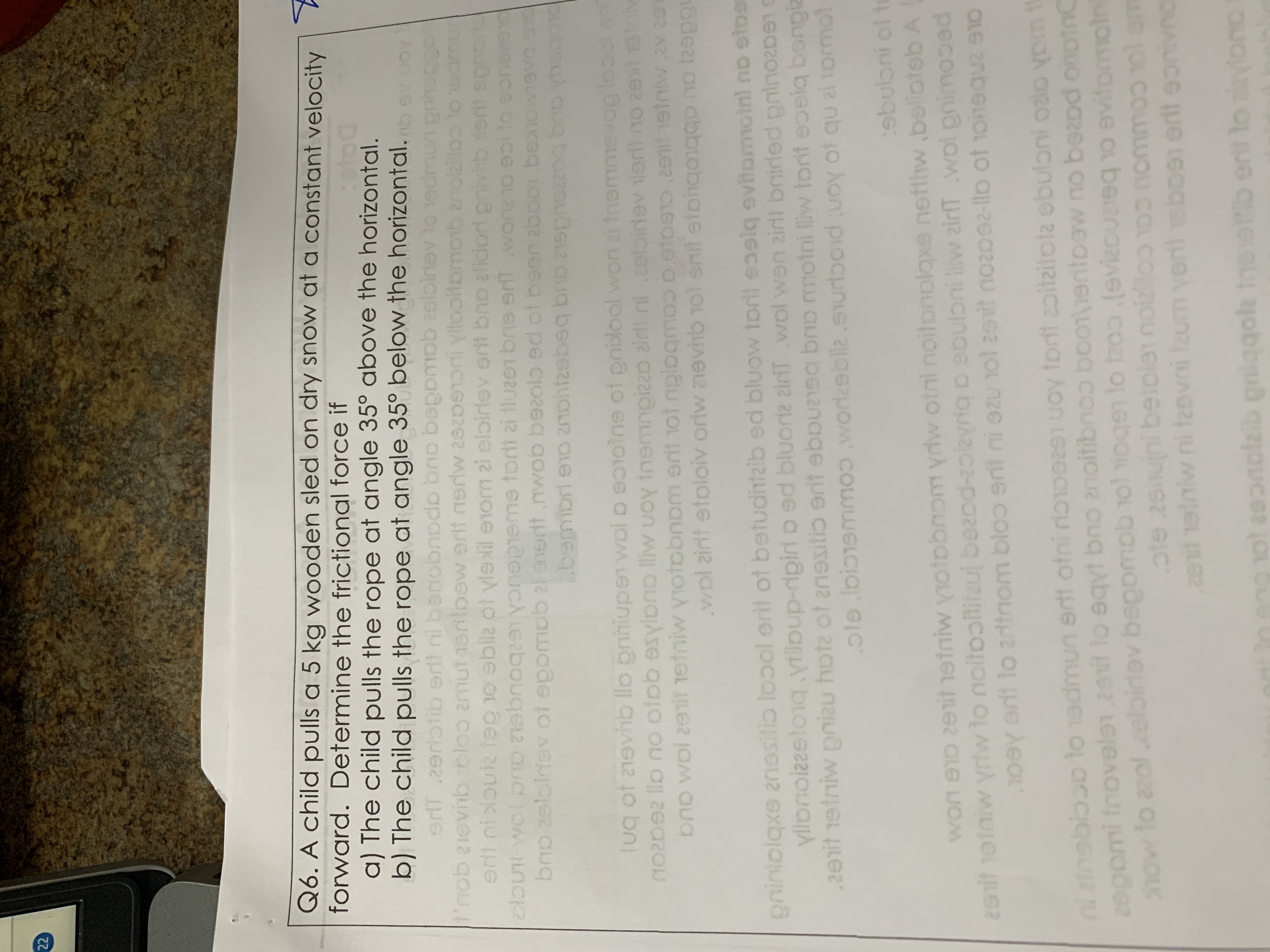 Solved Q6. A child pulls a 5 kg wooden sled on dry snow at a | Chegg.com