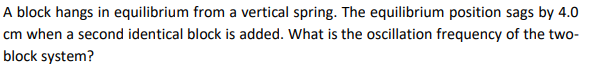 Solved A block hangs in equilibrium from a vertical spring. | Chegg.com