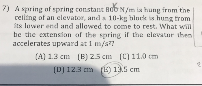 Solved 7) A spring of spring constant 800 N/m is hung from | Chegg.com