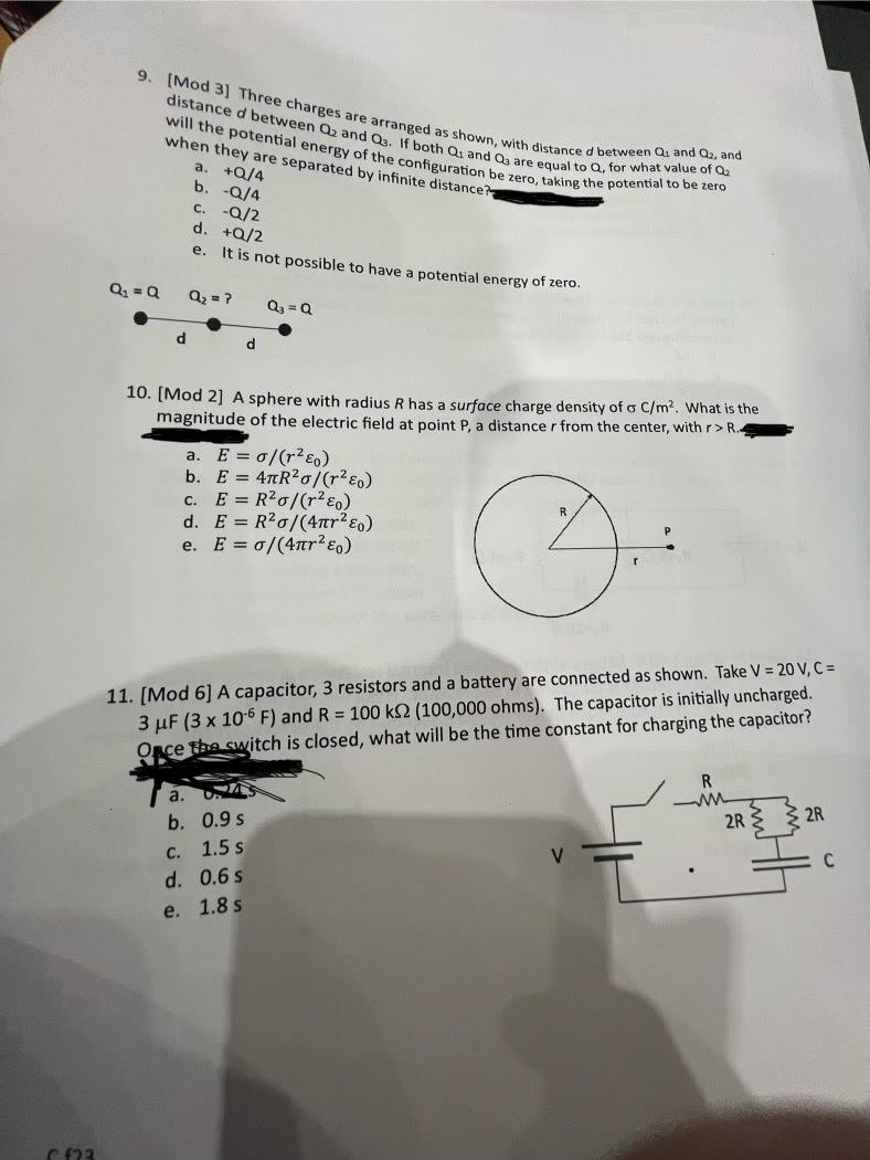 Solved [Mod 3] ﻿Three charges are arranged as shown, with | Chegg.com