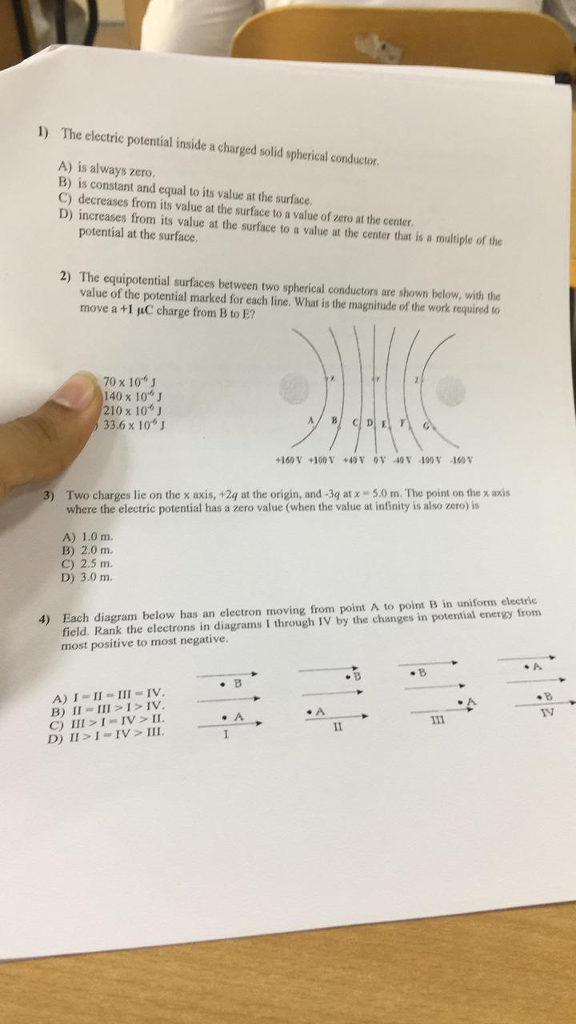 Solved 1) The electric potential inside a charged solid | Chegg.com