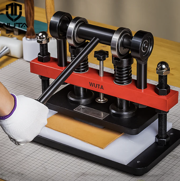 Solved For the image of the manual die cutting machine | Chegg.com
