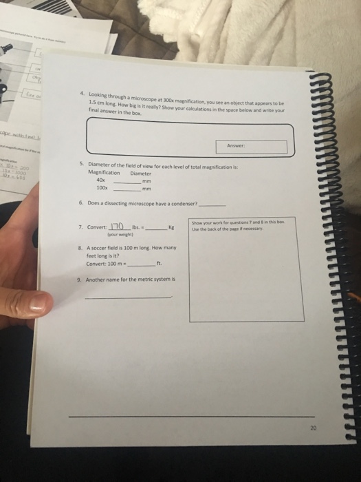 Solved 4 Looking through a microscope at 300x magnification, | Chegg.com