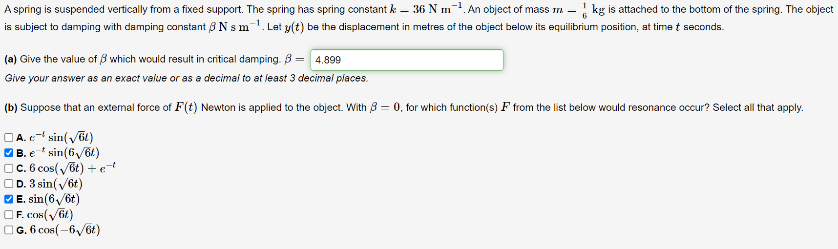 Solved A spring is suspended vertically from a fixed | Chegg.com