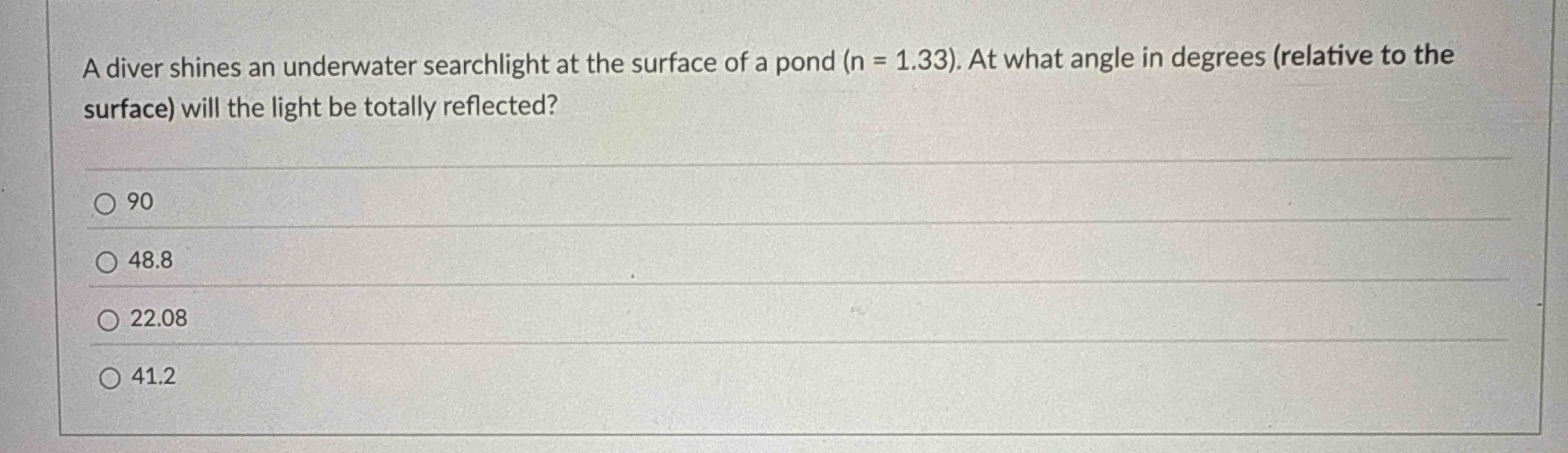 Solved A diver shines an underwater searchlight at the | Chegg.com