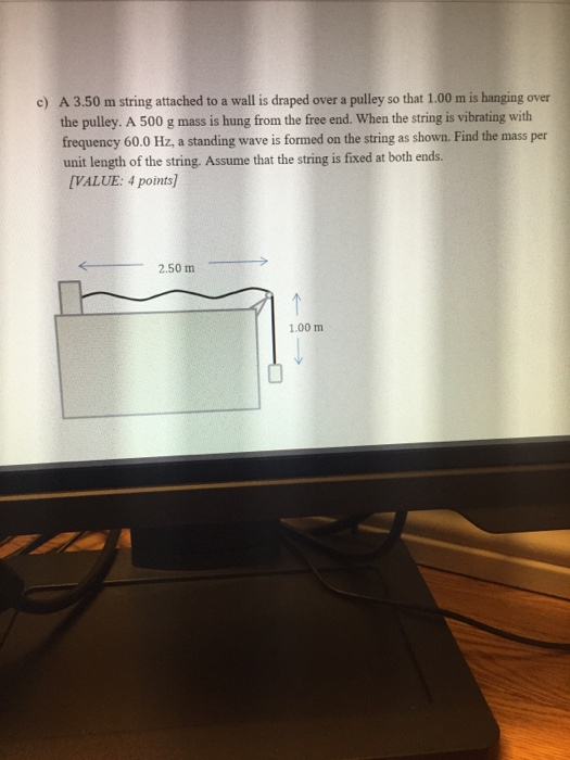 Solved A 3.50 m string attached to a wall is draped over a | Chegg.com