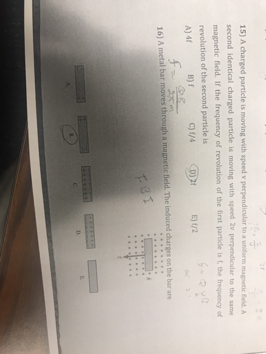 Solved 15) A charged particle is moving with speed v | Chegg.com