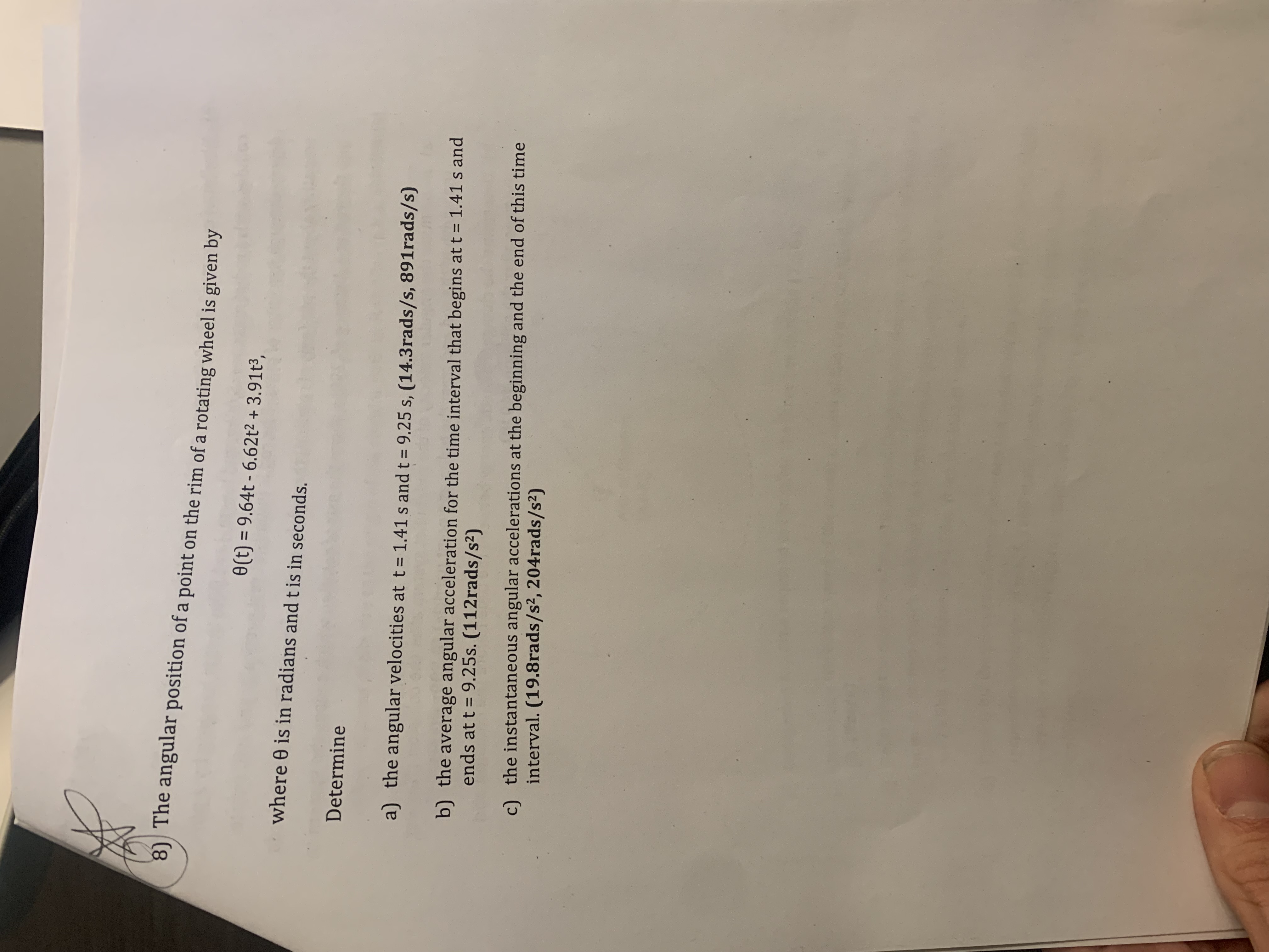 Solved The angular position of a point on the rim of a | Chegg.com