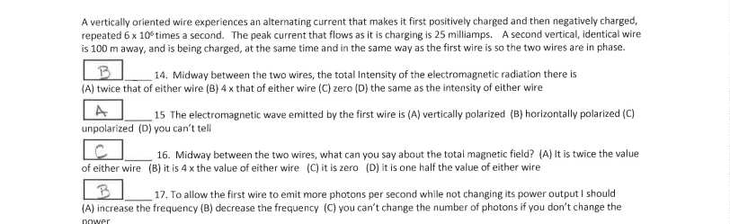 Solved A vertically oriented wire experiences an alternating | Chegg.com
