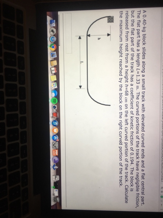 Solved A 0.40-kg block slides along a small track with | Chegg.com