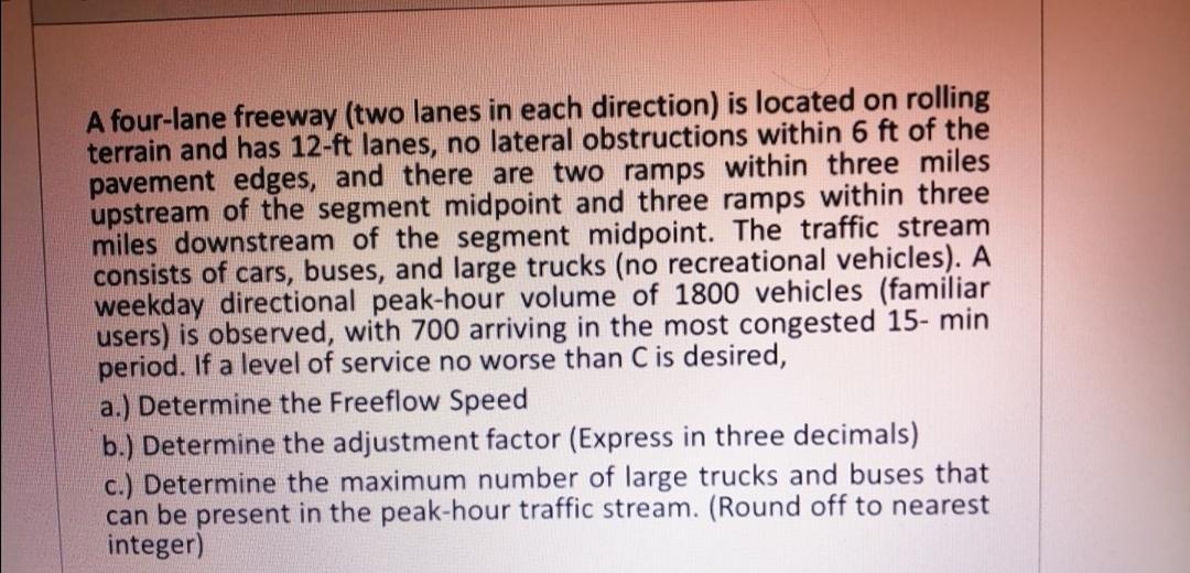 Solved A four-lane freeway (two lanes in each direction) is | Chegg.com
