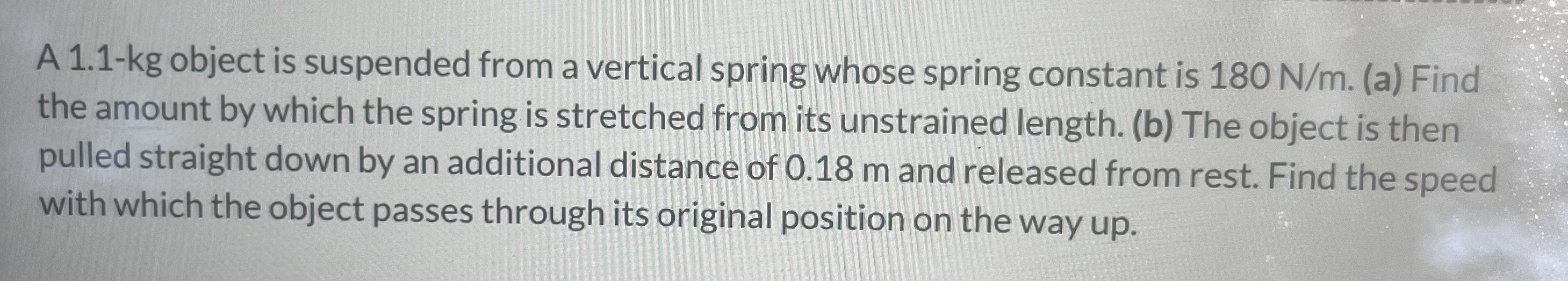 Solved A 1.1-kg object is suspended from a vertical spring | Chegg.com
