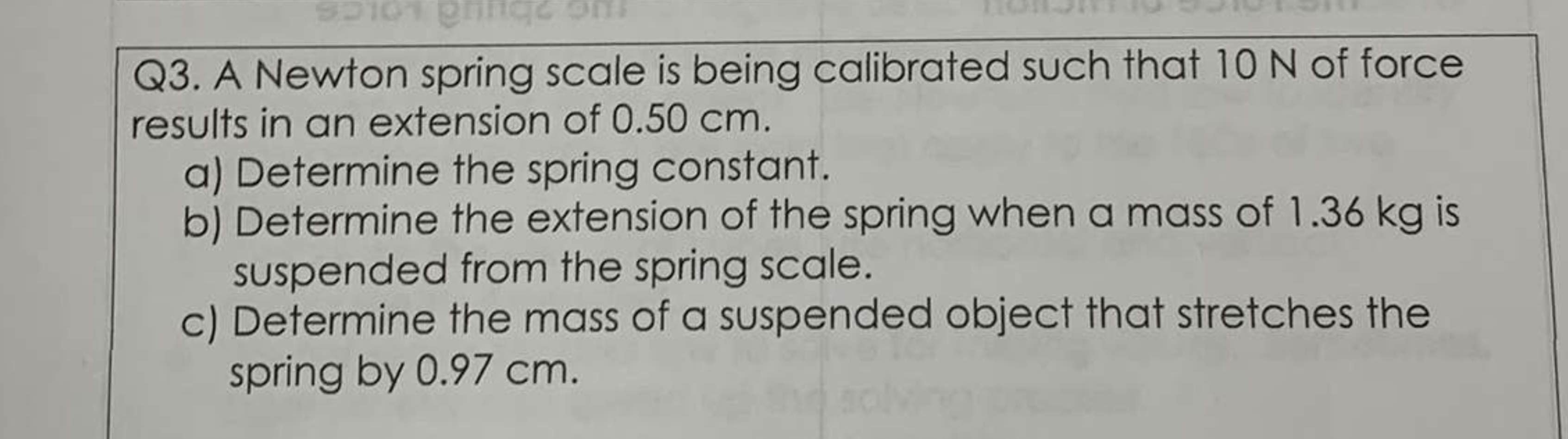 Solved Q3. ﻿A Newton spring scale is being calibrated such | Chegg.com