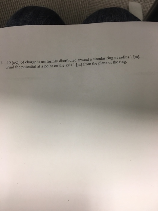 Solved 40 [nC] of charge is uniformly distributed around a | Chegg.com