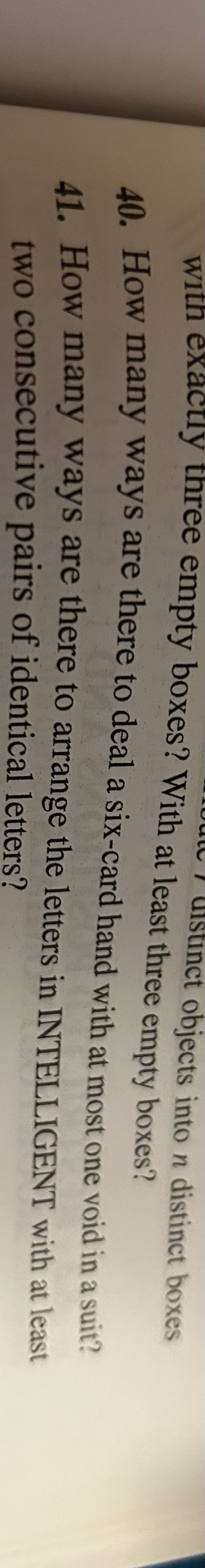 Solved With exactiy three empty boxes? With at leastinct | Chegg.com