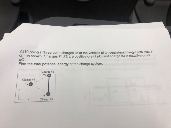 Solved 2.(10 points) Three point charges lie at the vertices | Chegg.com