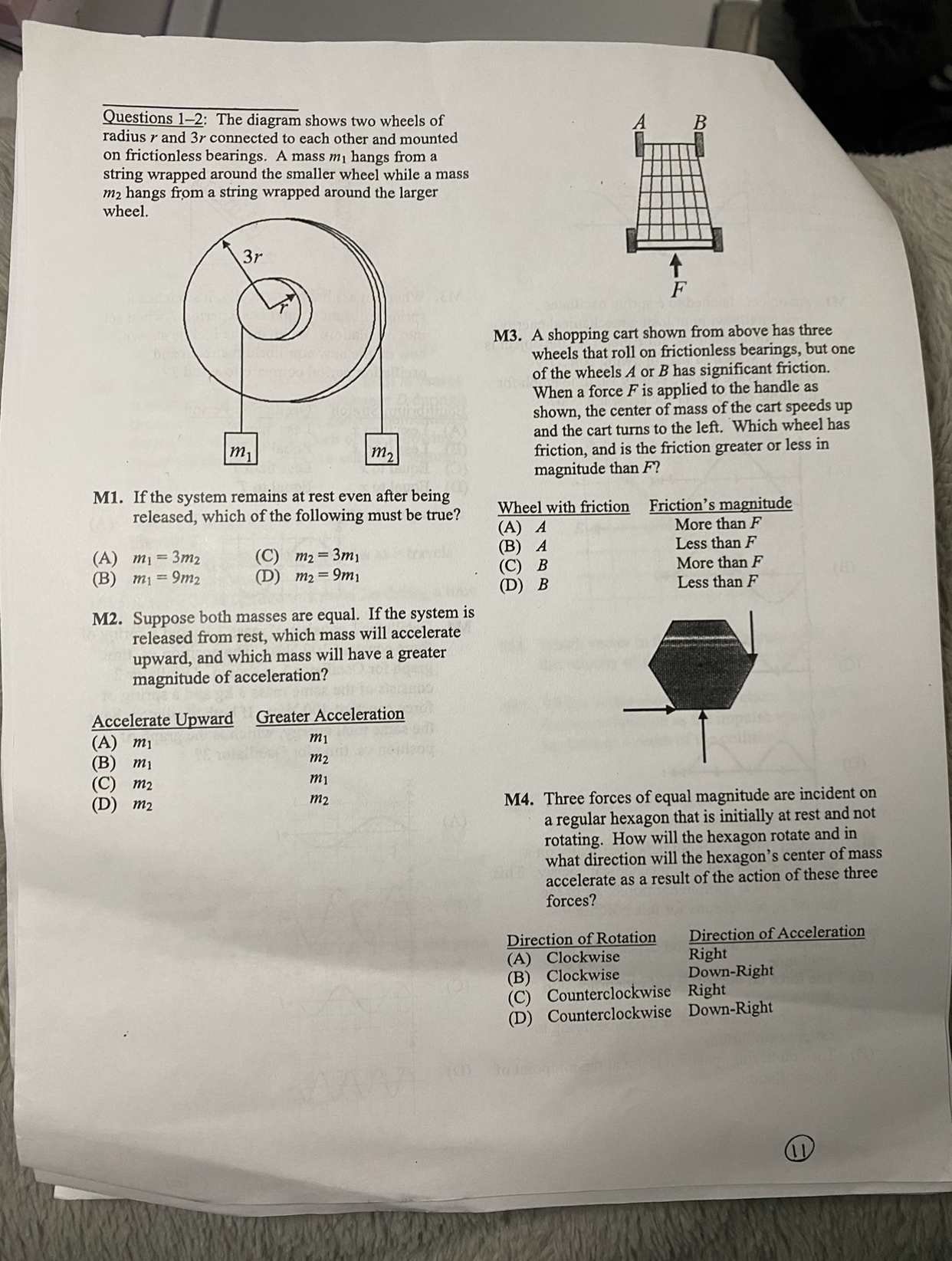Solved Questions 1-2: The diagram shows two wheels of radius | Chegg.com