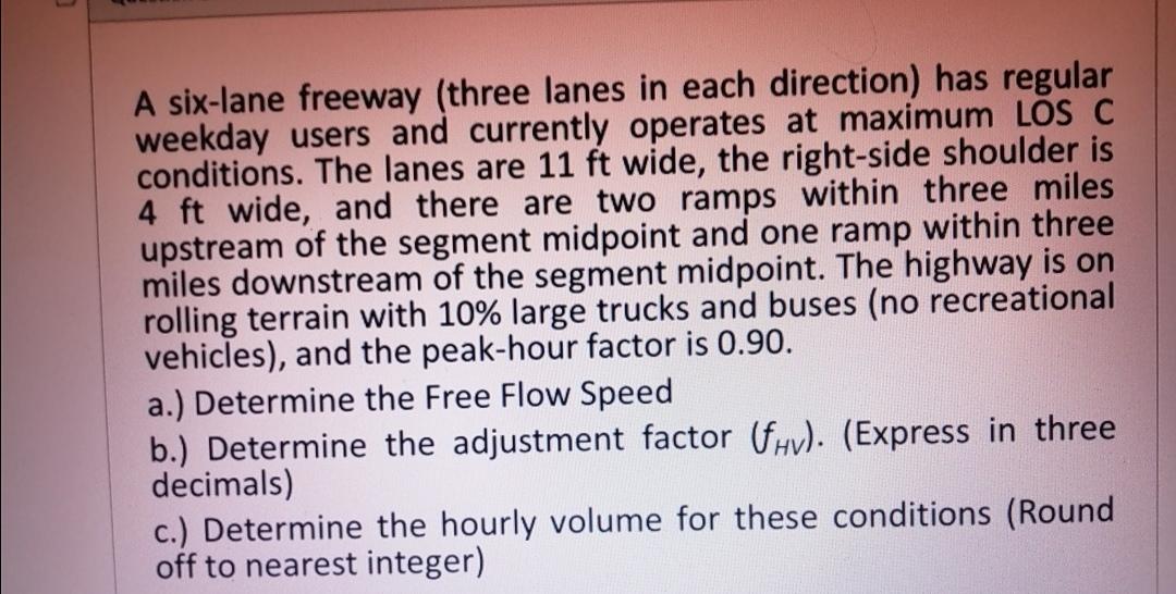 Solved A six-lane freeway (three lanes in each direction) | Chegg.com