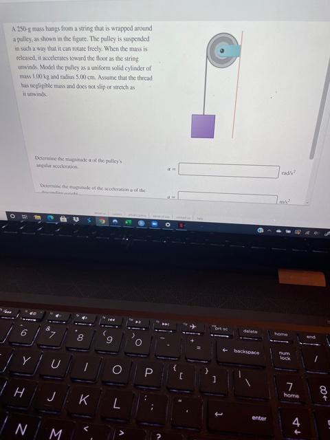 Solved A 250 g mass hangs from a string that is wrapped | Chegg.com