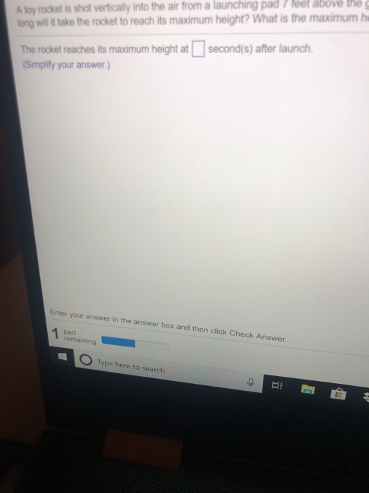 Solved A toy rocket is shot vertically into the air from a | Chegg.com