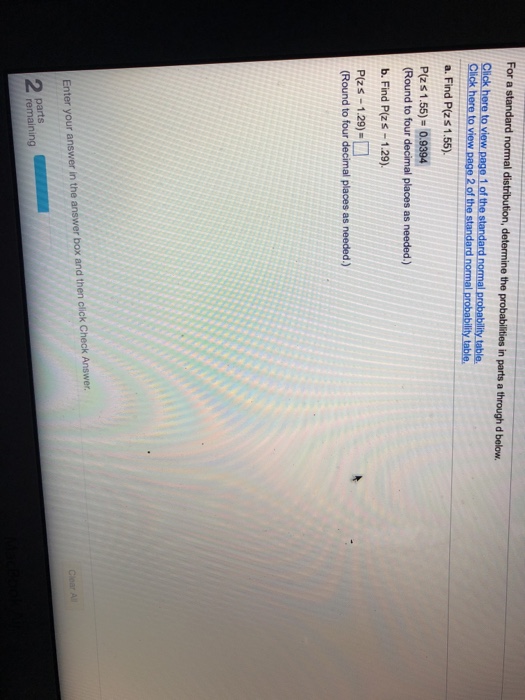 Solved For a standard normal distribution, determine the | Chegg.com