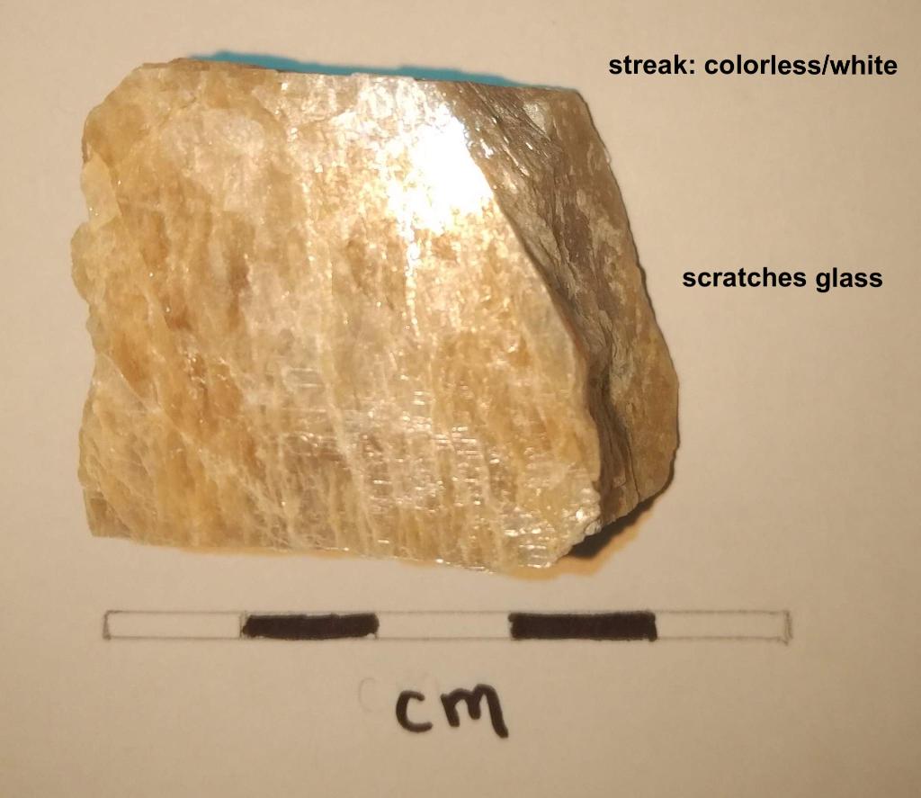 Solved streak: colorless/white scratches glass cm | Chegg.com
