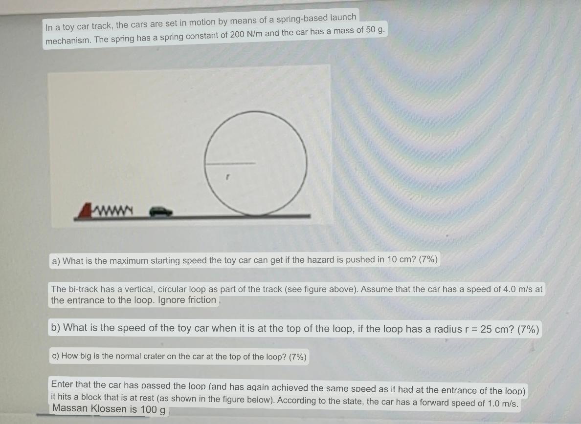 Solved In a toy car track, the cars are set in motion by | Chegg.com