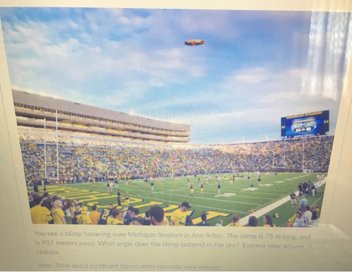 You see a blimp hovering over Michigan Stadium in Ann | Chegg.com