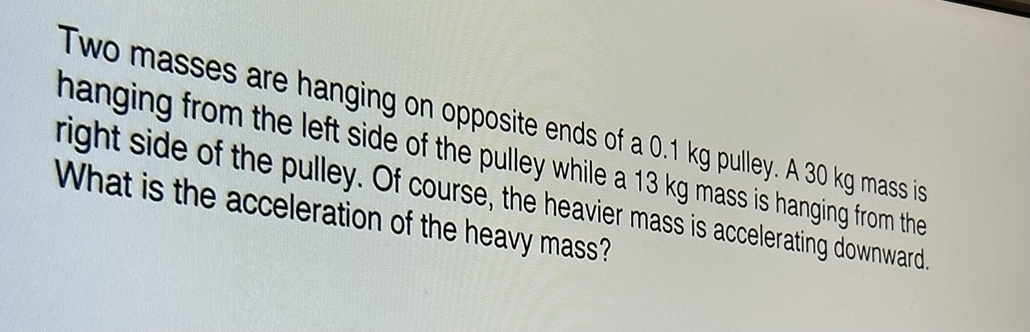 Solved Two masses are hanging on opposite ends of a 0.1 kg | Chegg.com
