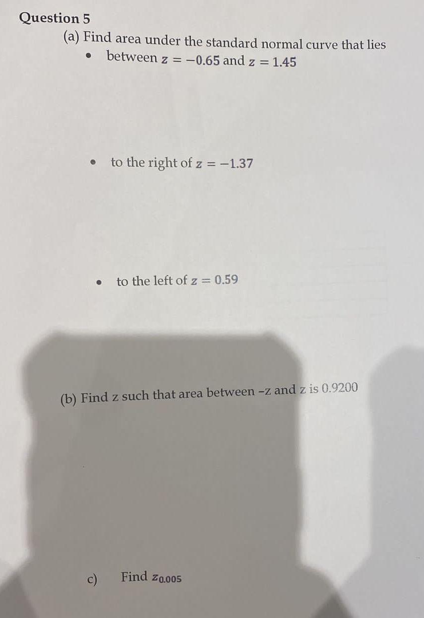 Solved (a) Find area under the standard normal curve that | Chegg.com