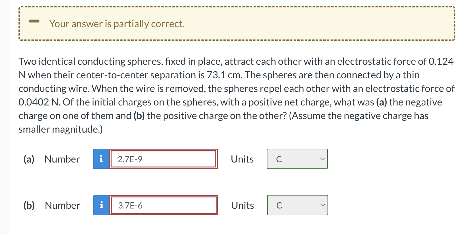 Solved Two identical conducting spheres, fixed in place, | Chegg.com