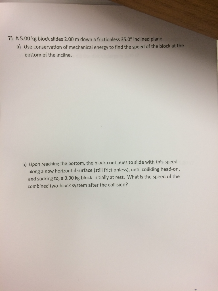 Solved 7 A5.00 kg block slides 2.00 m down a frictionless | Chegg.com