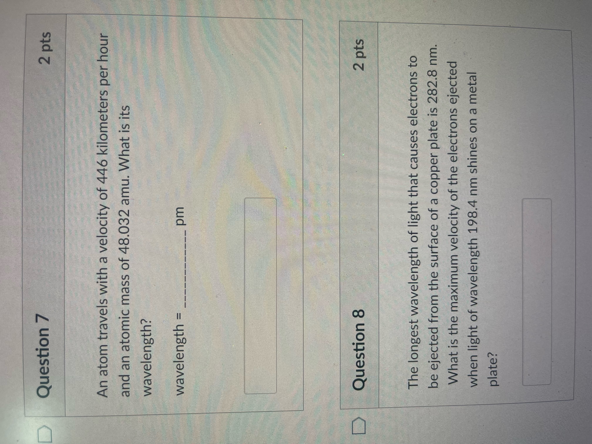 Solved Question 7 2 pts An atom travels with a velocity of | Chegg.com